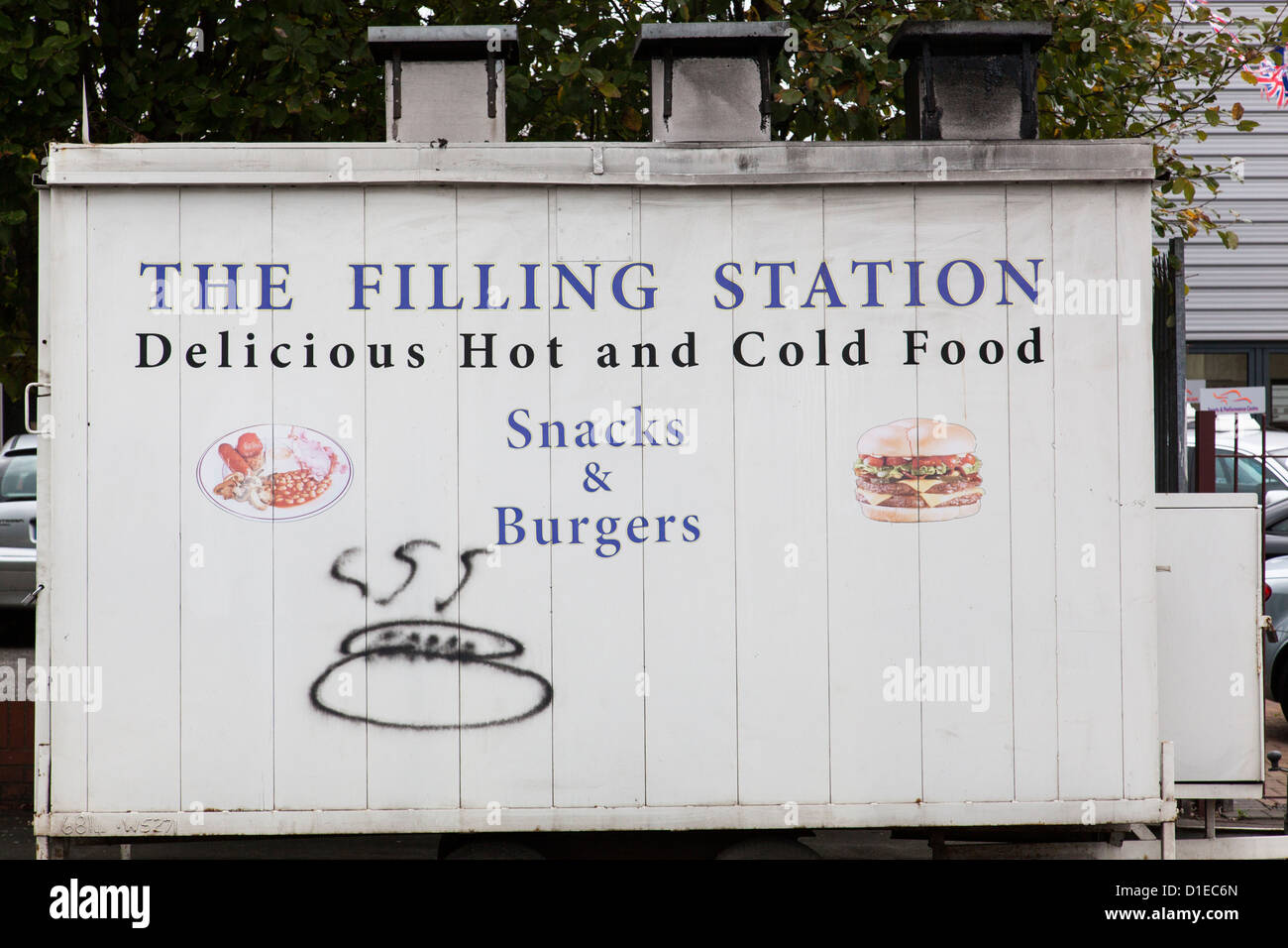 Fast food snack and burger stand with added graffiti Stock Photo - Alamy