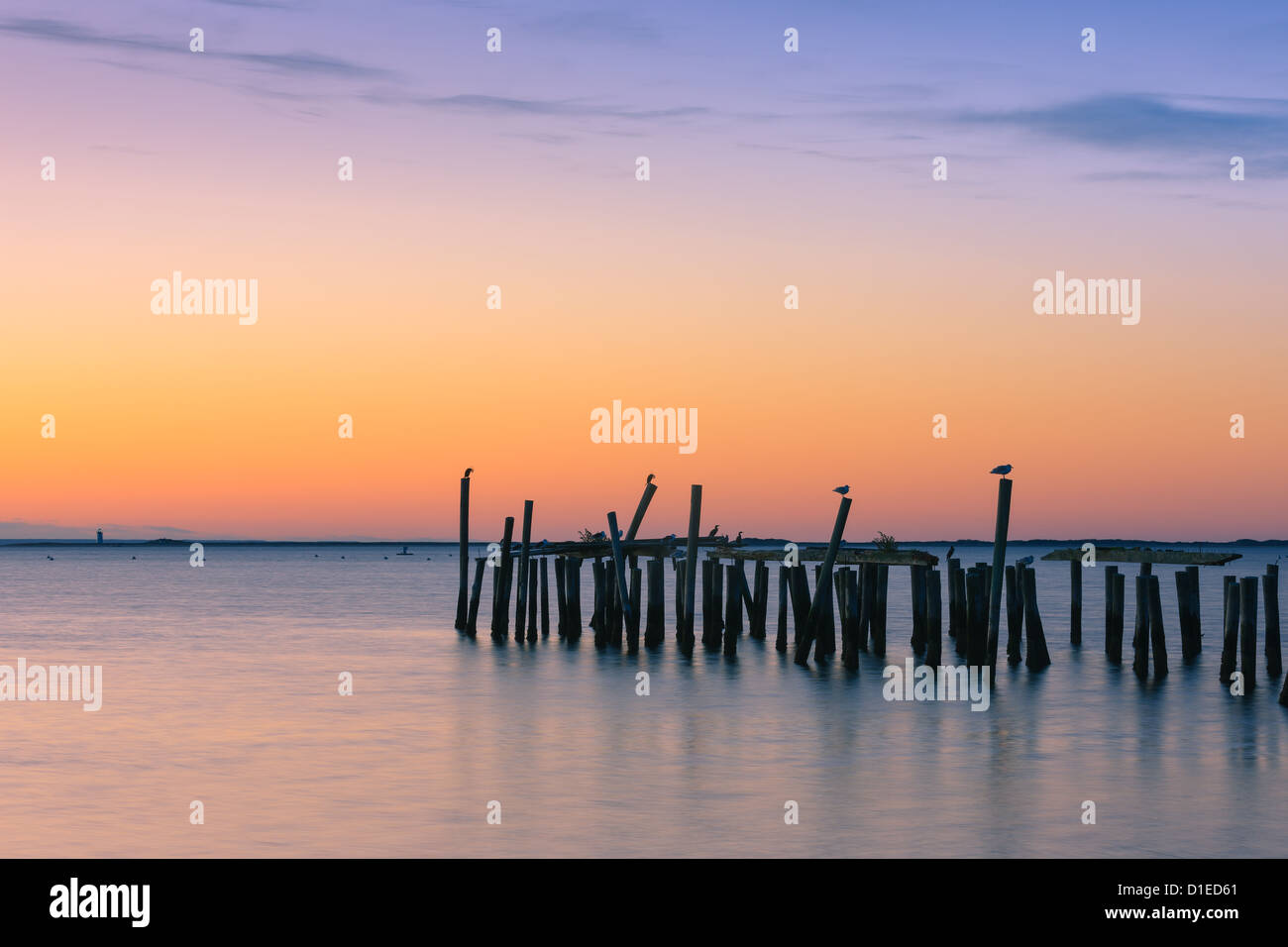 Sunrise over the old jety in Provincetown on the north of Cape Cod ...