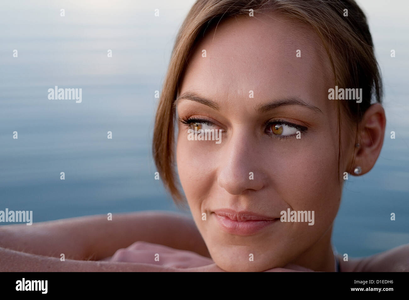 Woman staring at lake hi-res stock photography and images - Alamy