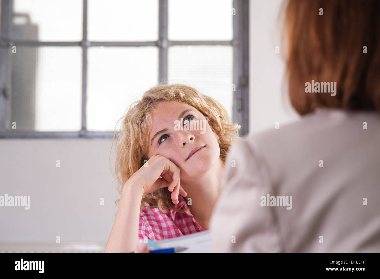 Apprentice and female head having a job interview Stock Photo - Alamy