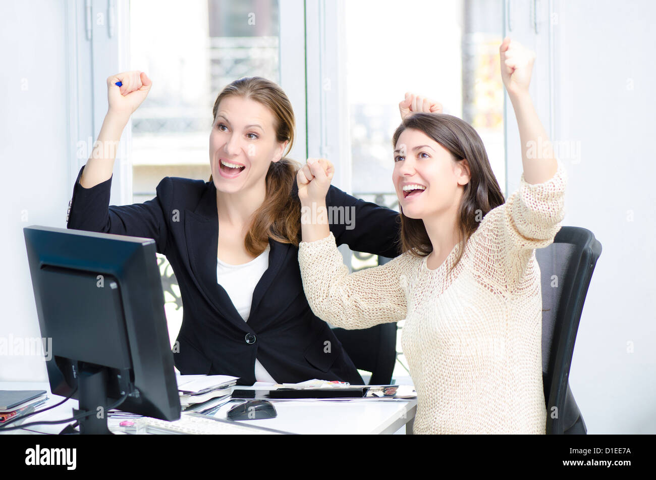 Young businesswomen enjoying their sucess Stock Photo - Alamy