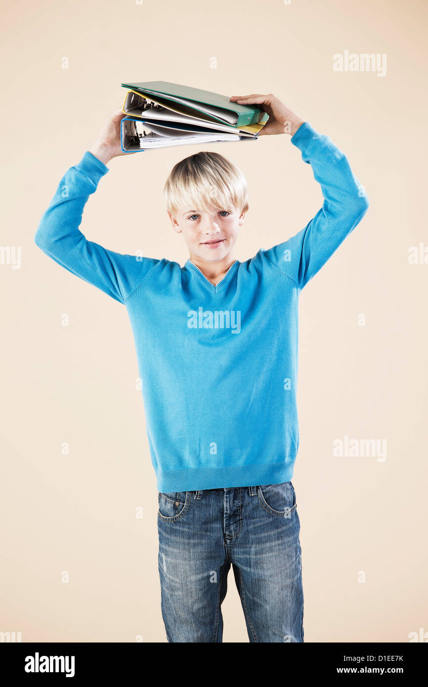 Boy folders hi-res stock photography and images - Alamy