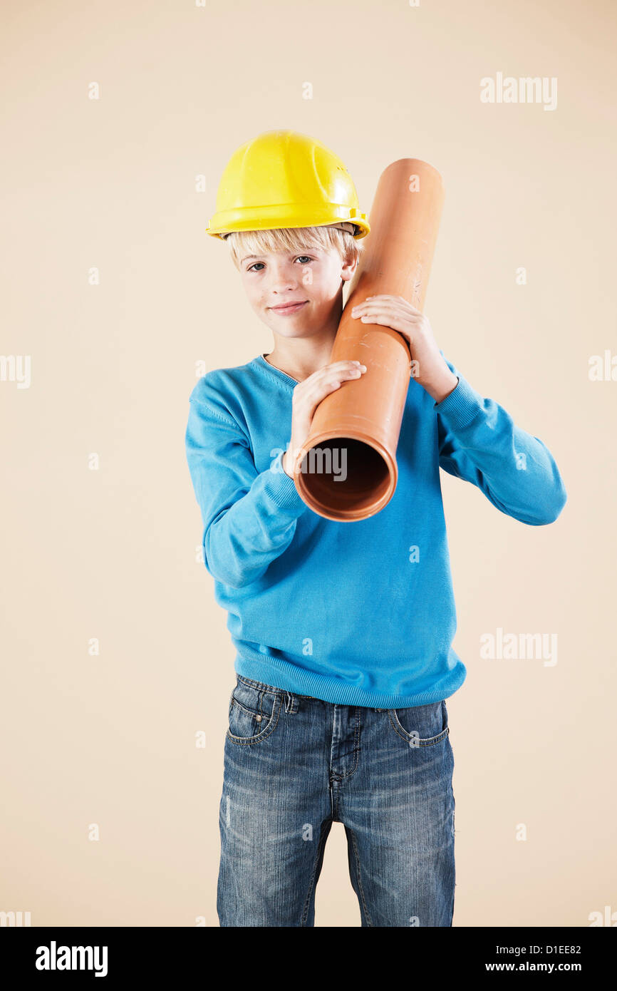 Blond boy with hard helm Stock Photo - Alamy