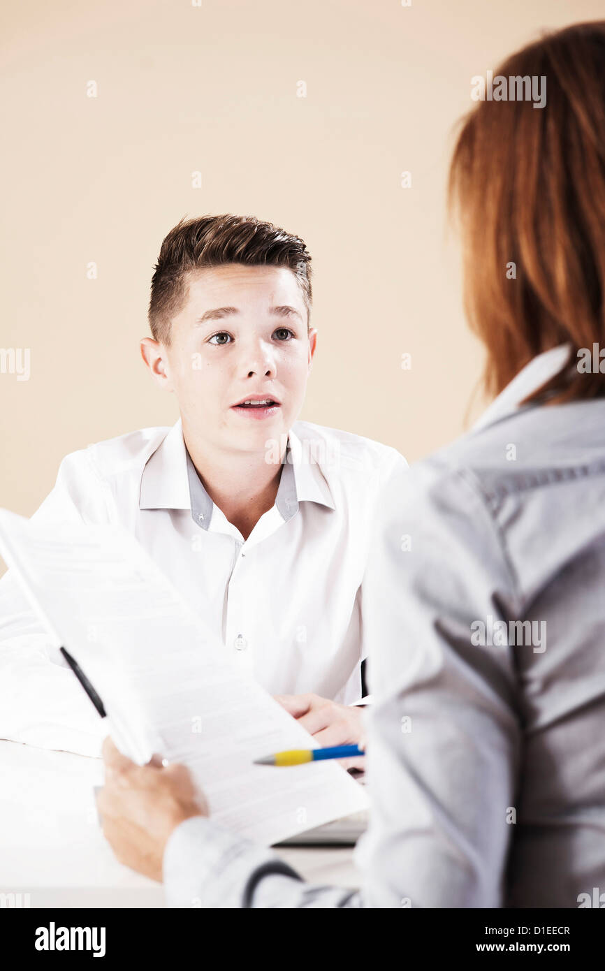 Teenage boy having a job interview Stock Photo - Alamy