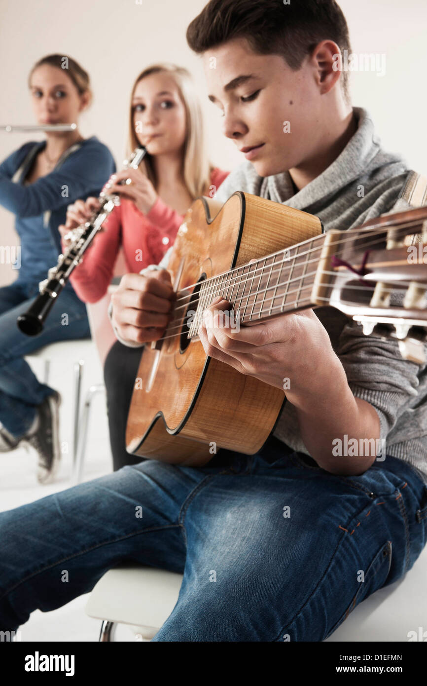 Teenager flute playing hi-res stock photography and images - Alamy