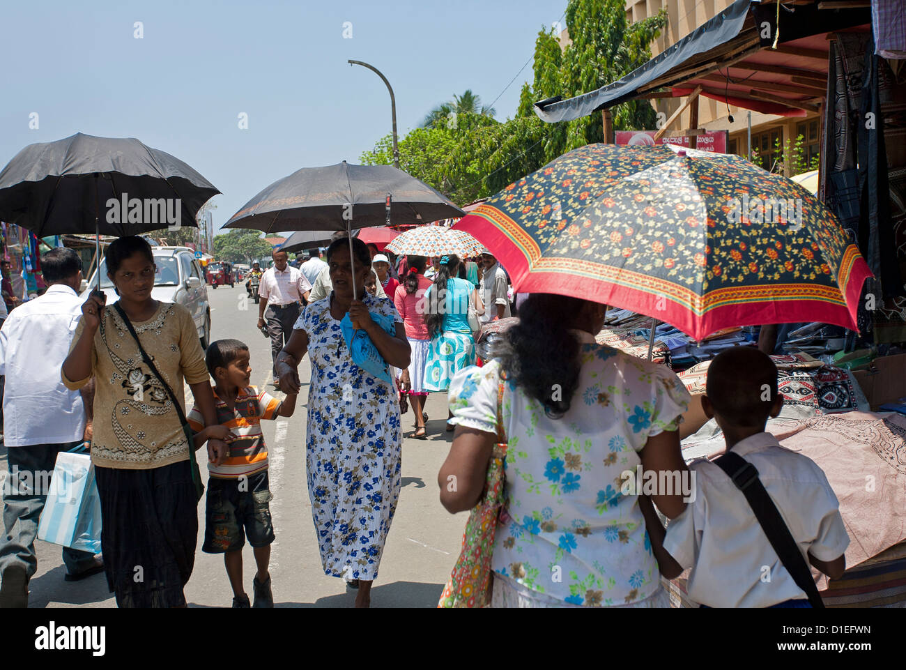 Woman umbrellas protect hi-res stock photography and images - Alamy