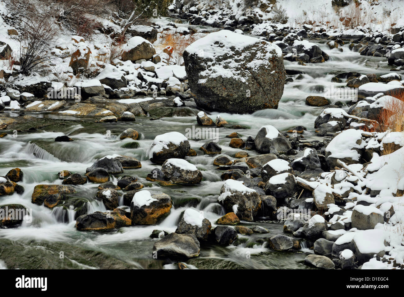 Fresh snow, boulders and rapids in the Gardner River, Yellowstone ...