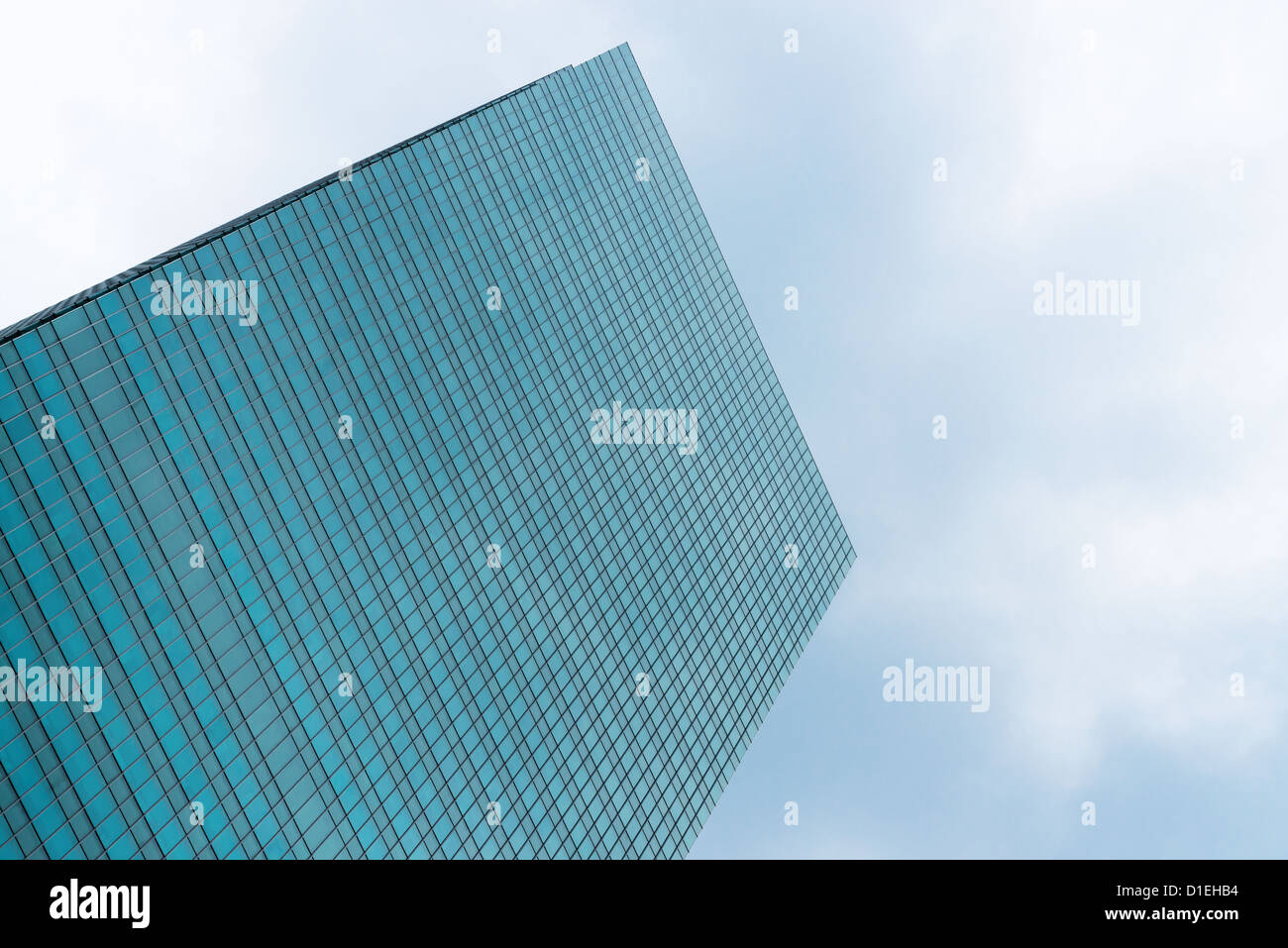 Modern glass skyscraper with dark sky on background Stock Photo - Alamy