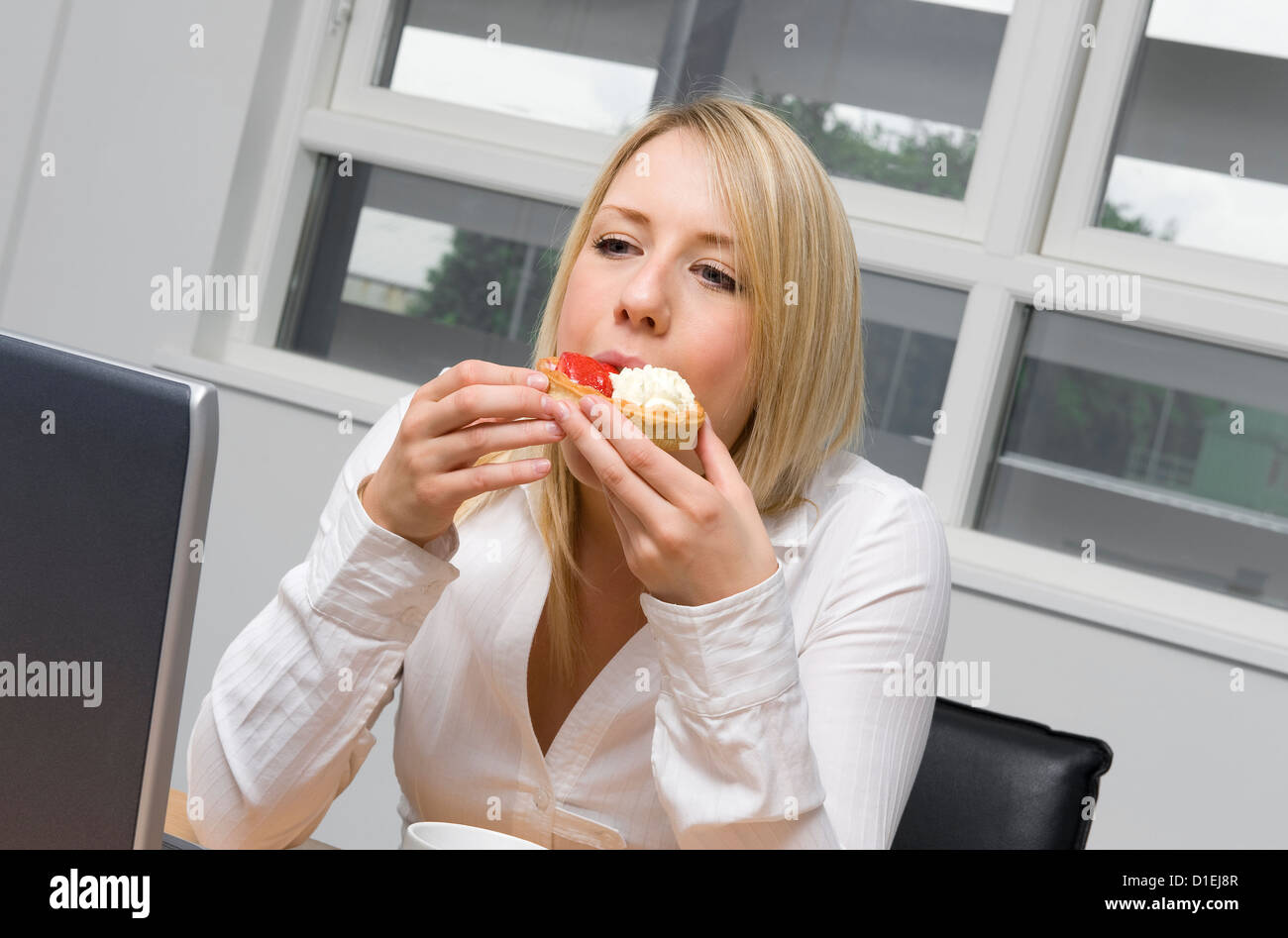 Woman cake office hi-res stock photography and images - Alamy