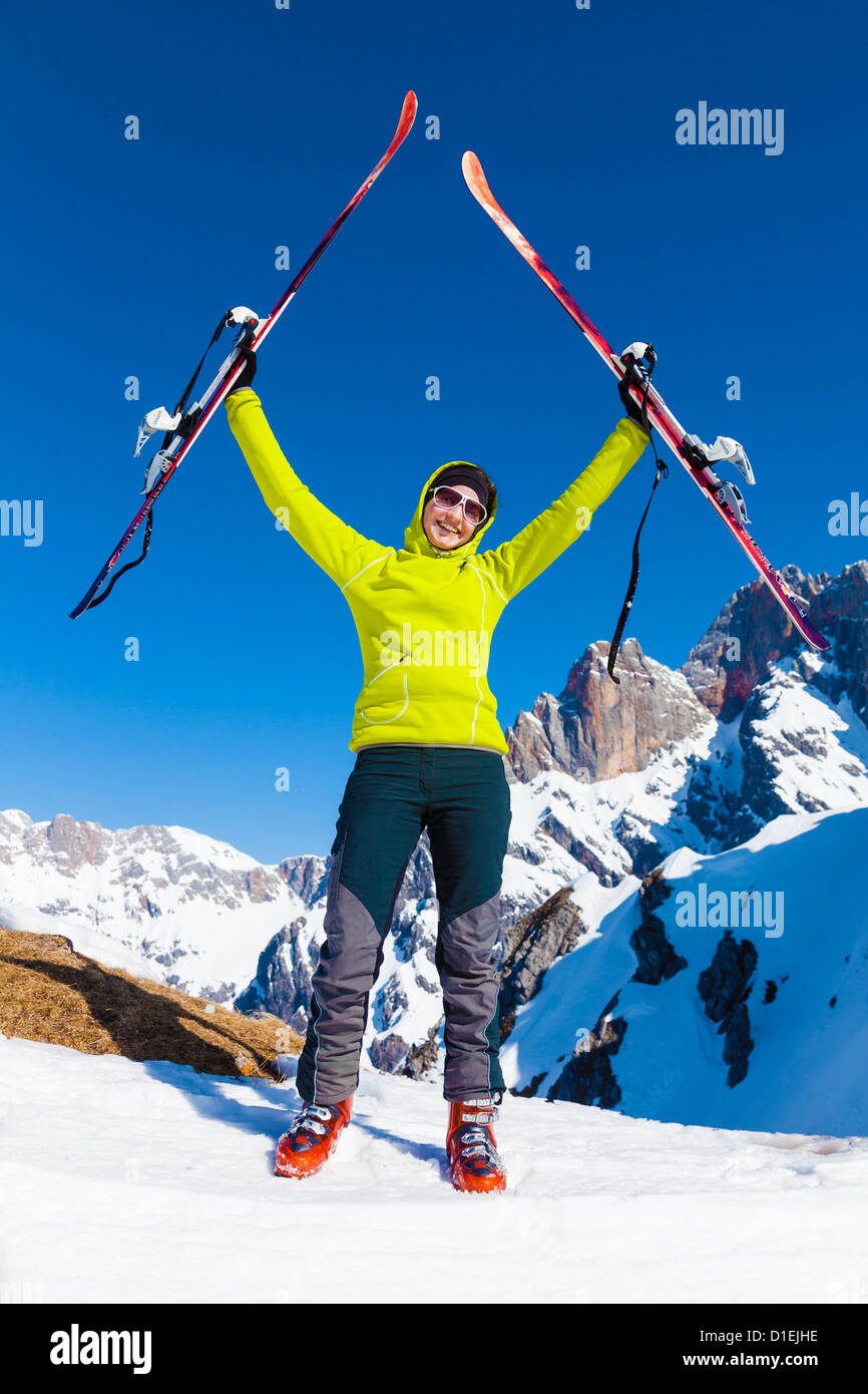 Woman with skis cheering at the Hochkoenig, Berchtesgaden Alps Stock ...