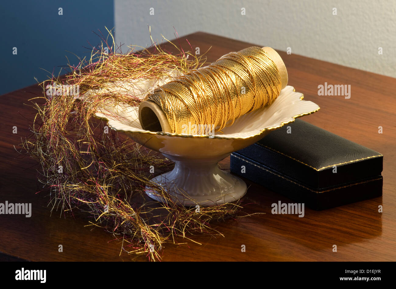 gold gift wrap and fancy box Stock Photo - Alamy