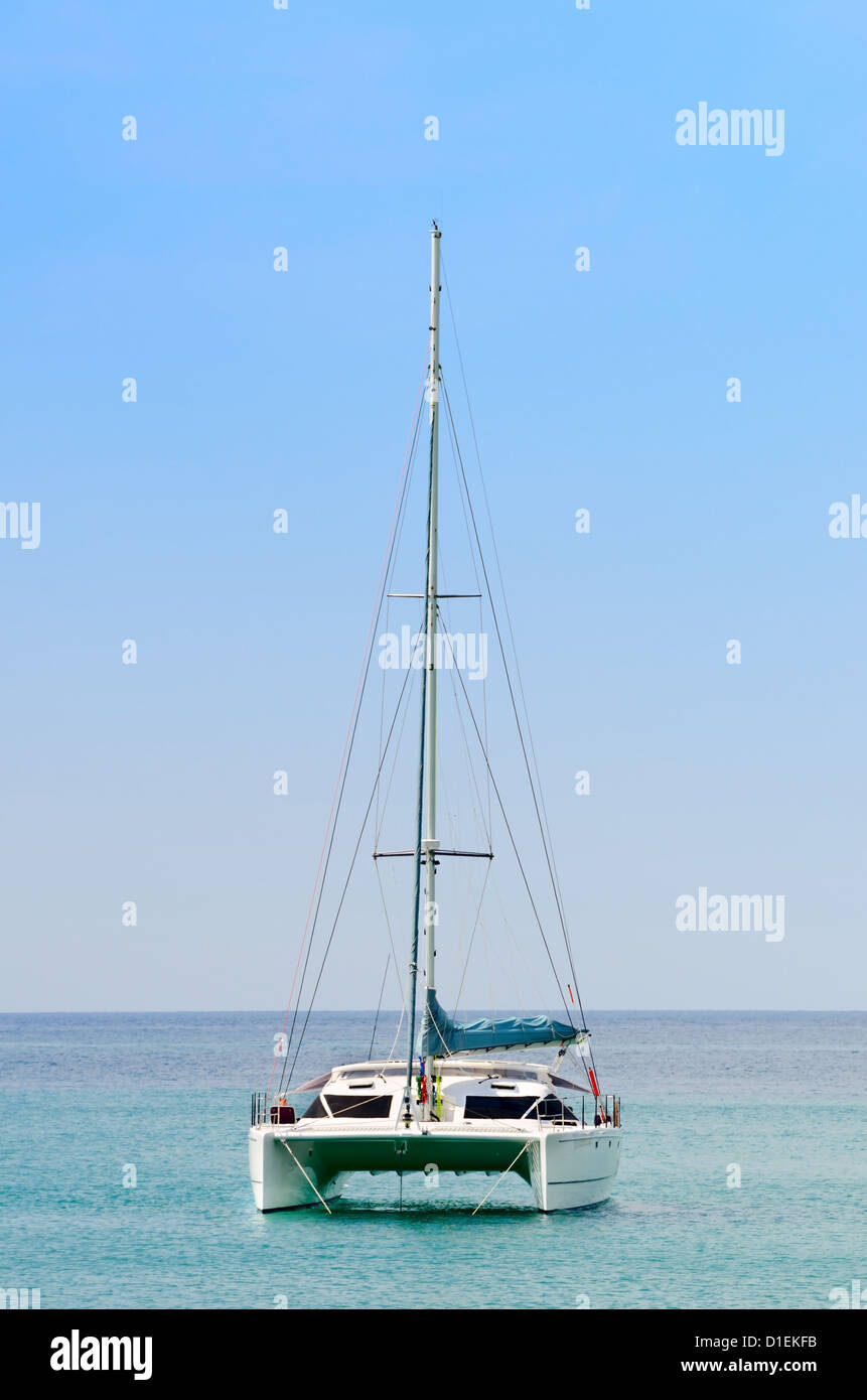 Luxury white sail catamaran boat in the sea with blue sky Stock Photo ...