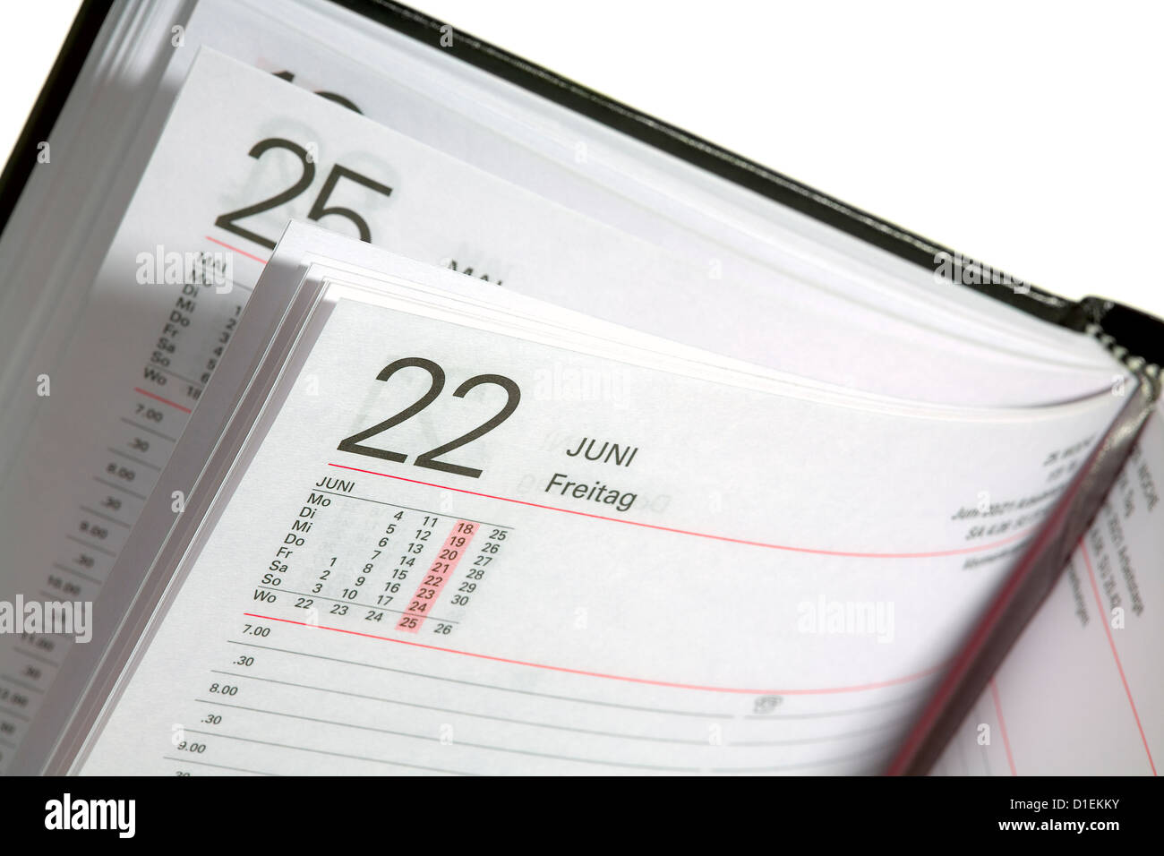 Close up of a open diary, isolated on white background Stock Photo - Alamy