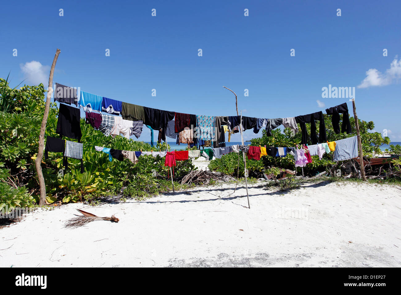Clothesline on the beach of the Baa Atoll, Maldives Stock Photo - Alamy