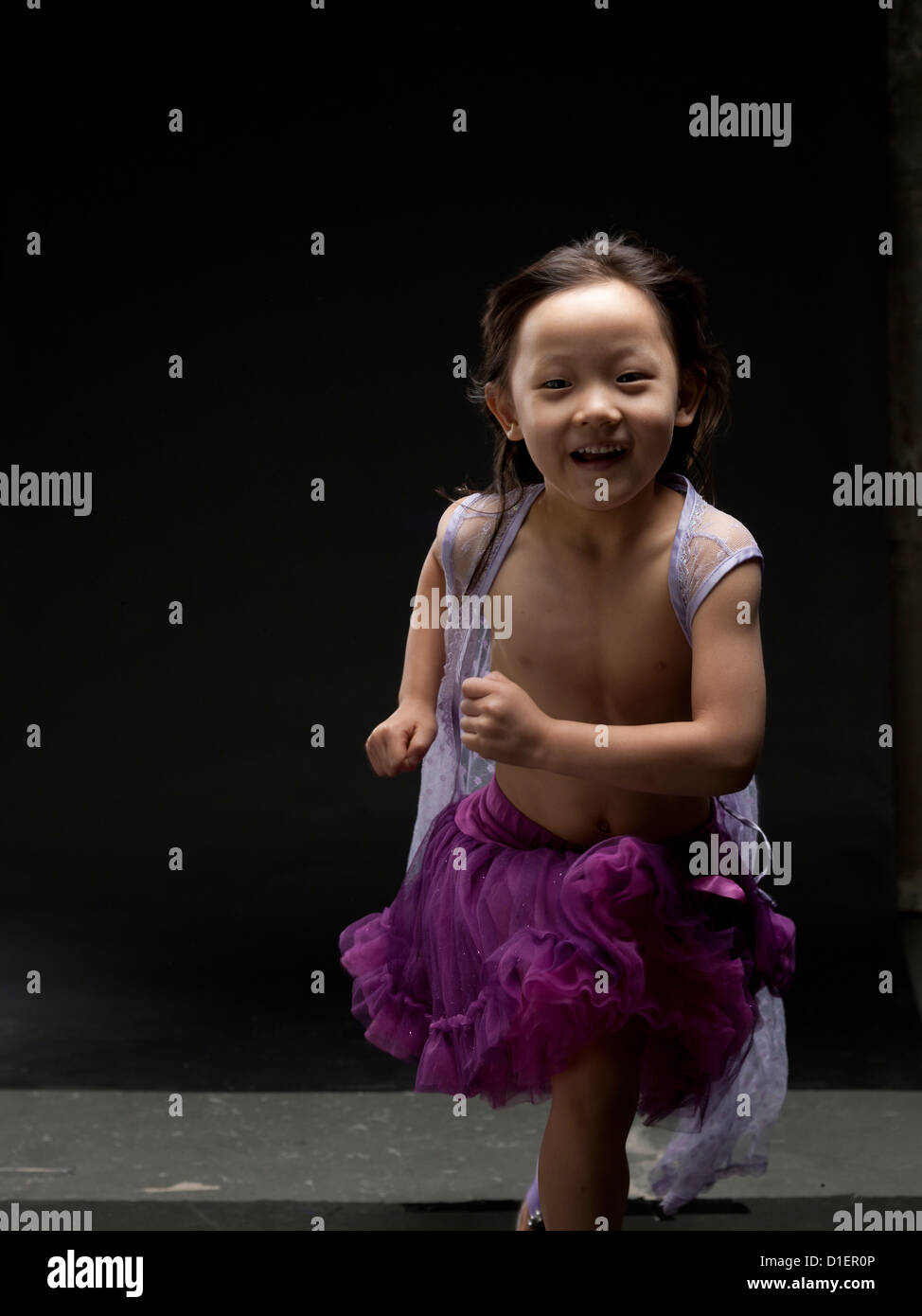 Young Asian twins dancing and performing gymnastics Stock Photo - Alamy