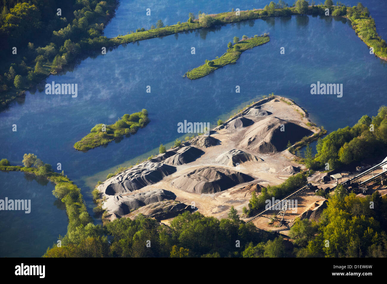 Gravel quarry dredging lake hi-res stock photography and images - Alamy