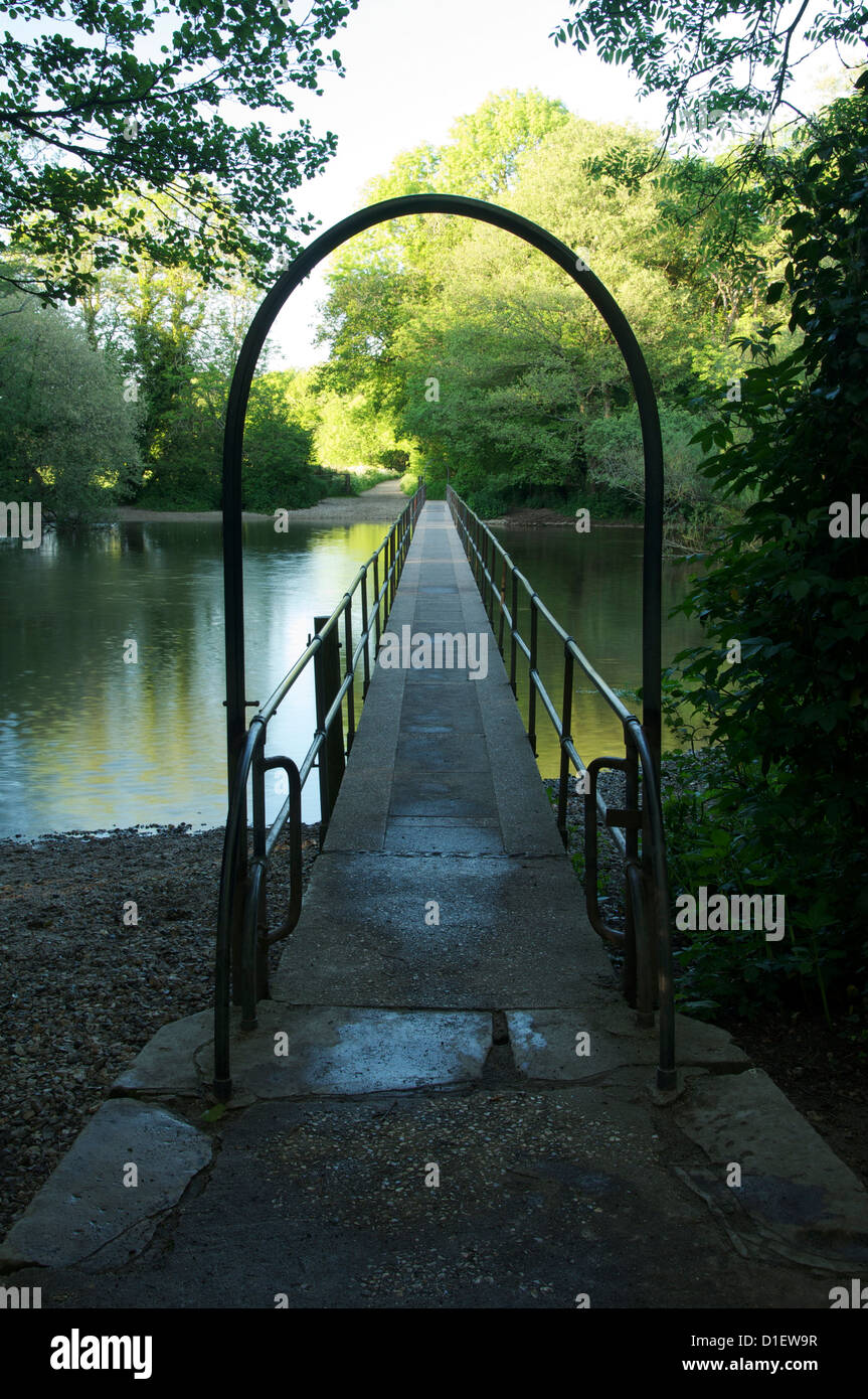 A tranquil summer evening by the ford at Moreton. A long pedestrian ...