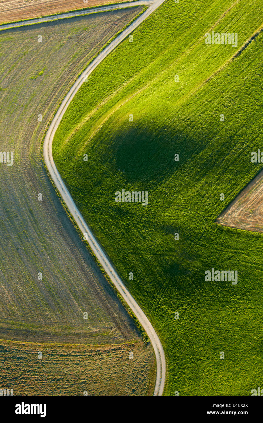 Plowed field, meadow and path, aerial photo Stock Photo - Alamy