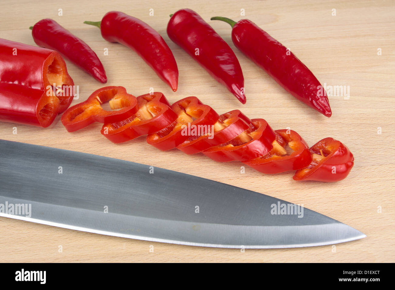 Chili peppers cut prepared Stock Photo - Alamy