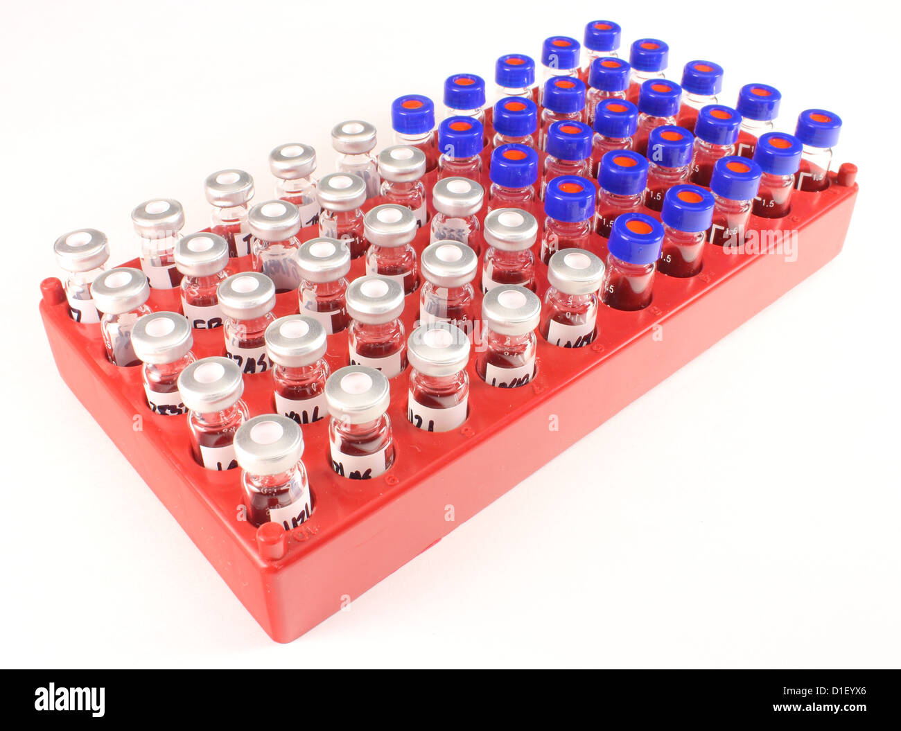 Silver And Blue Vials On White Stock Photo - Alamy