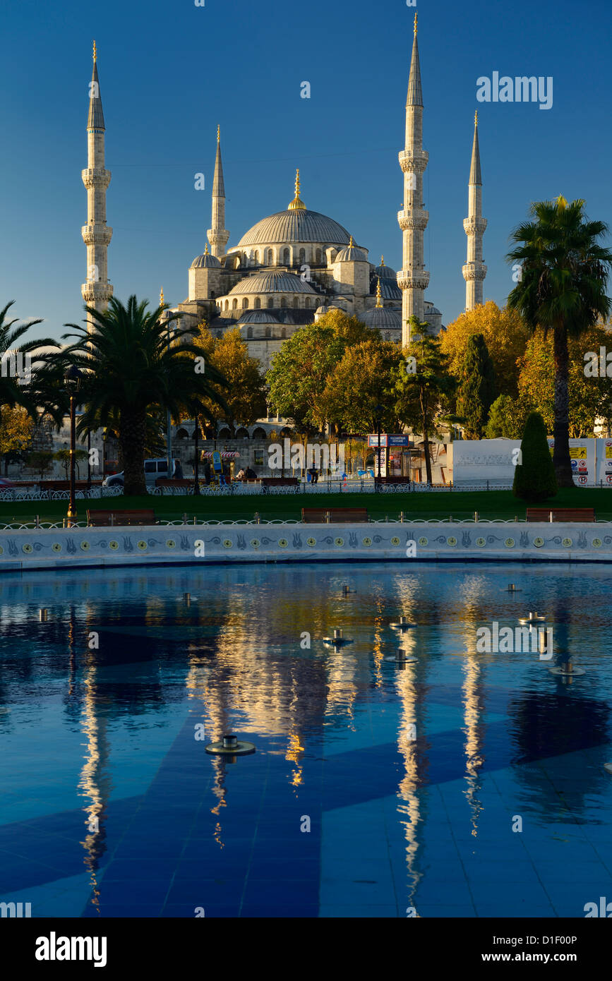 Blue Mosque in early morning sun with reflection in pool Istanbul ...