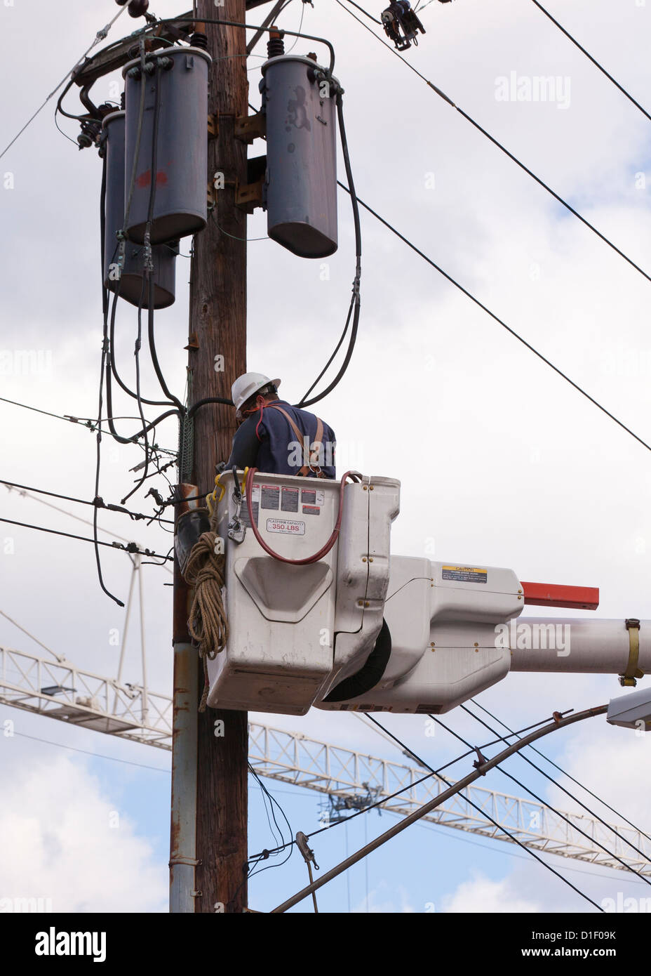 Lineman on utility pole hi-res stock photography and images - Alamy