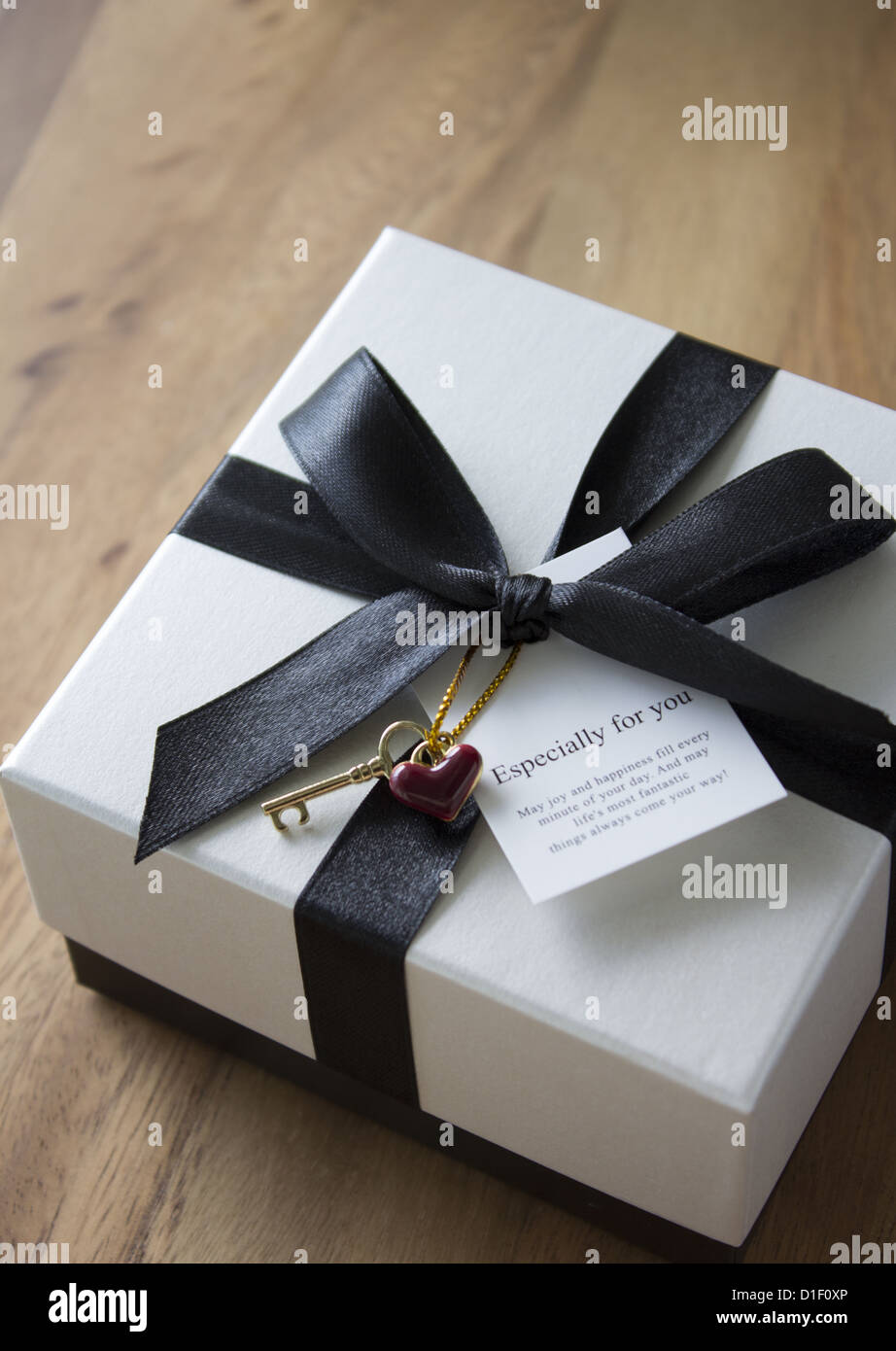 Message card and a gift box Stock Photo - Alamy