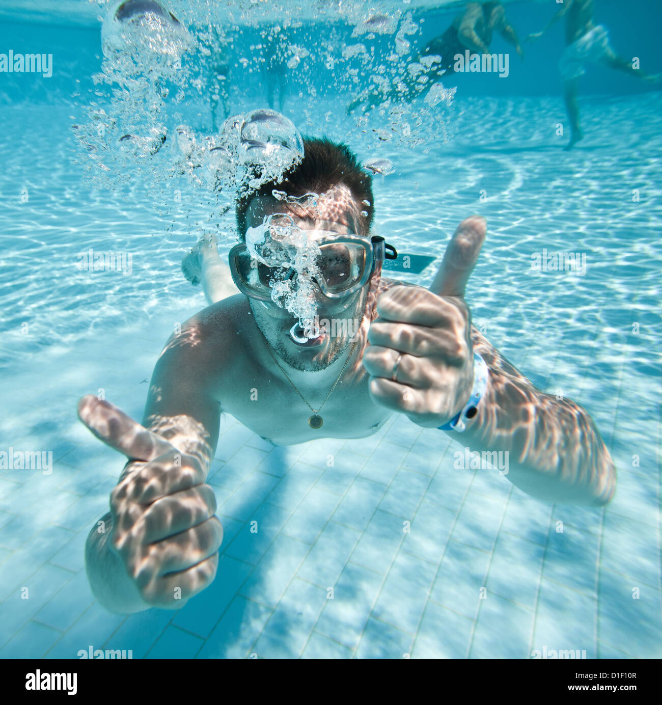 Person underwater hi-res stock photography and images - Alamy