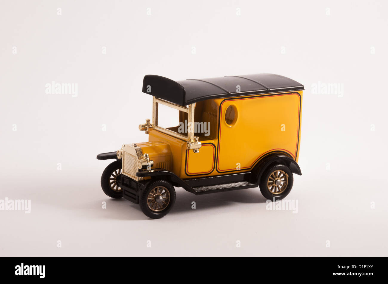 A model of a yellow delivery van Stock Photo - Alamy