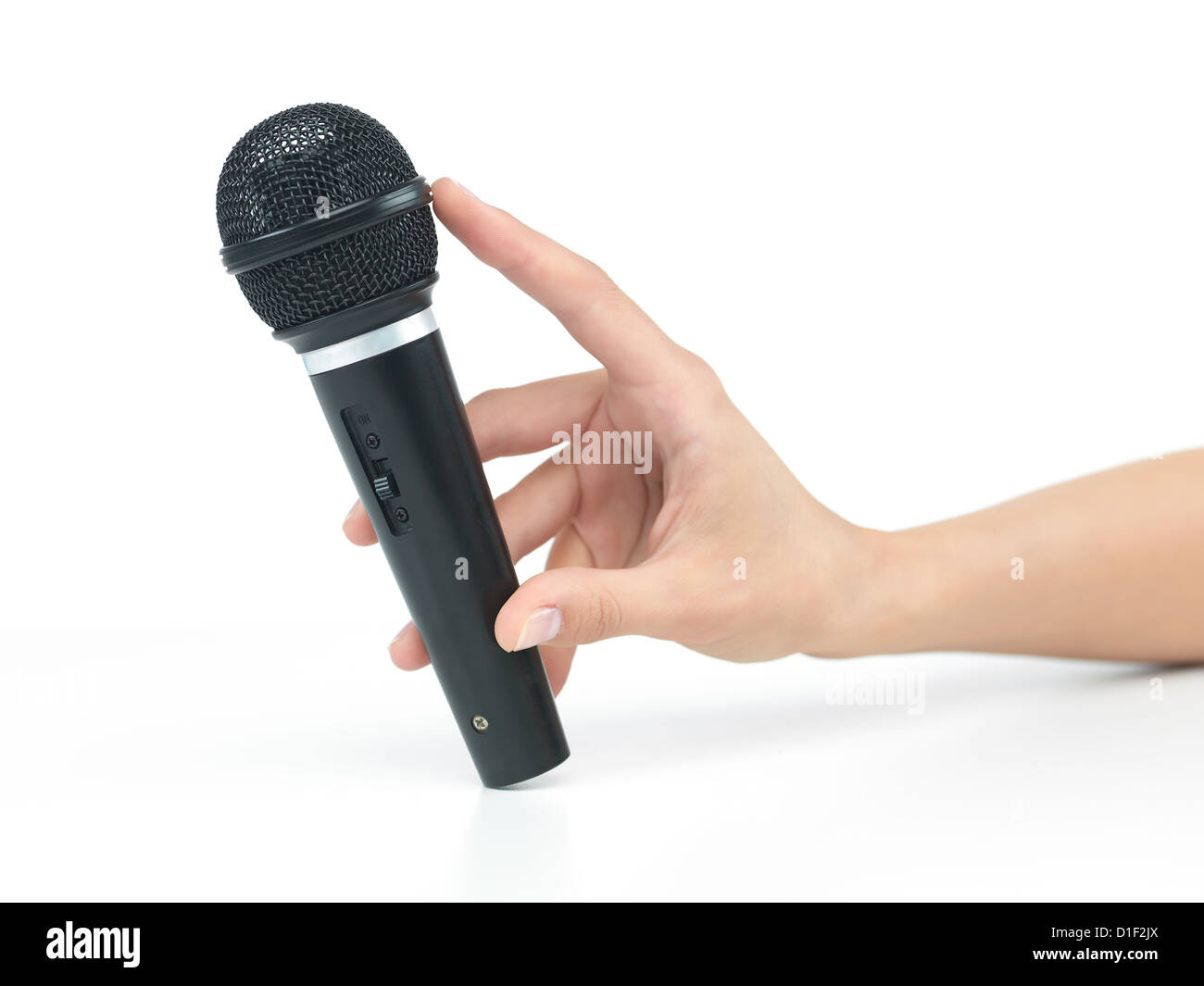 Hand with microphone isolated on white background Stock Photo - Alamy