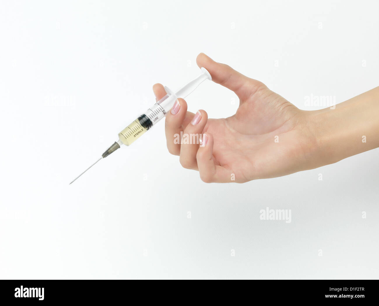 hand with syringe isolated on white background Stock Photo - Alamy