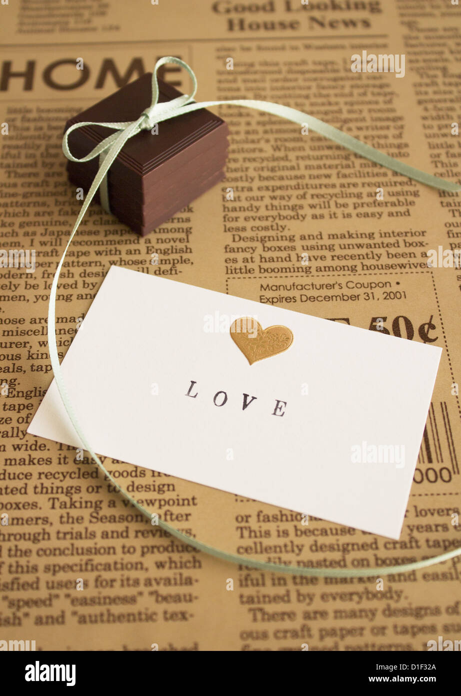 Chocolates tied with ribbon and a message card Stock Photo - Alamy