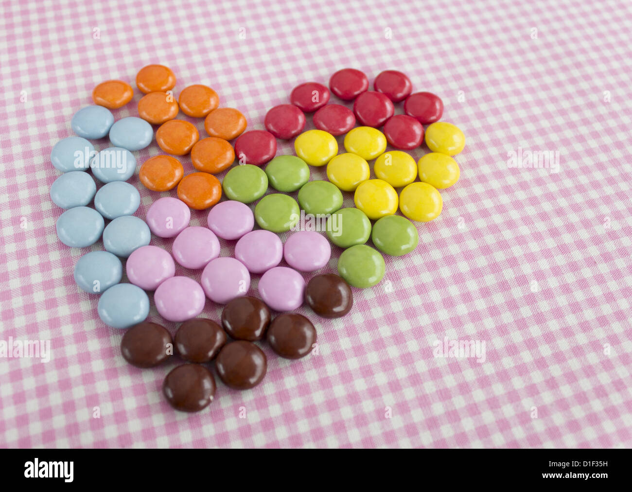 Heart-shaped chocolate marbles Stock Photo - Alamy