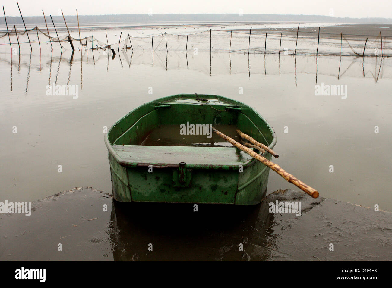 Empty punt, a small boat on autumn fish pond-lake Southern Bohemia ...