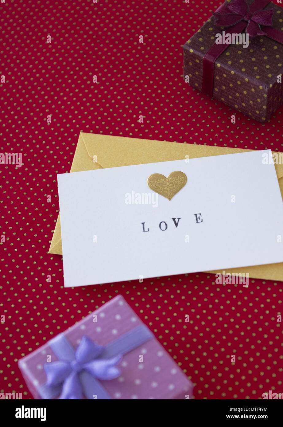 Gift box and a love letter Stock Photo - Alamy
