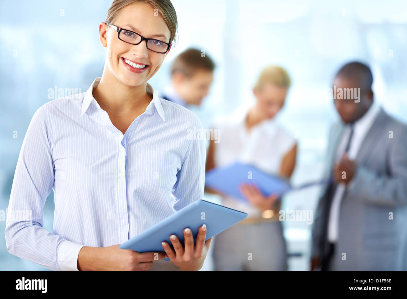 Portrait of smart secretary with notepad looking at camera Stock Photo ...