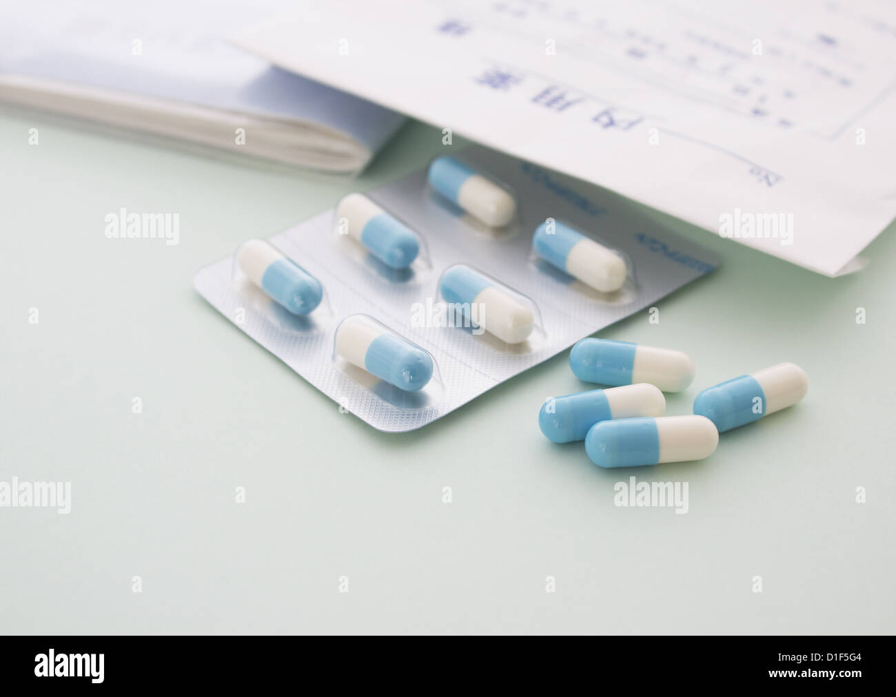 Drug envelope and capsules Stock Photo - Alamy