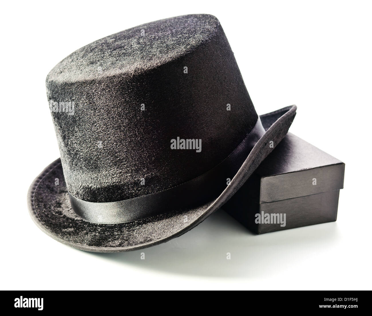 Black top hat and gift box isolated on white background Stock Photo - Alamy