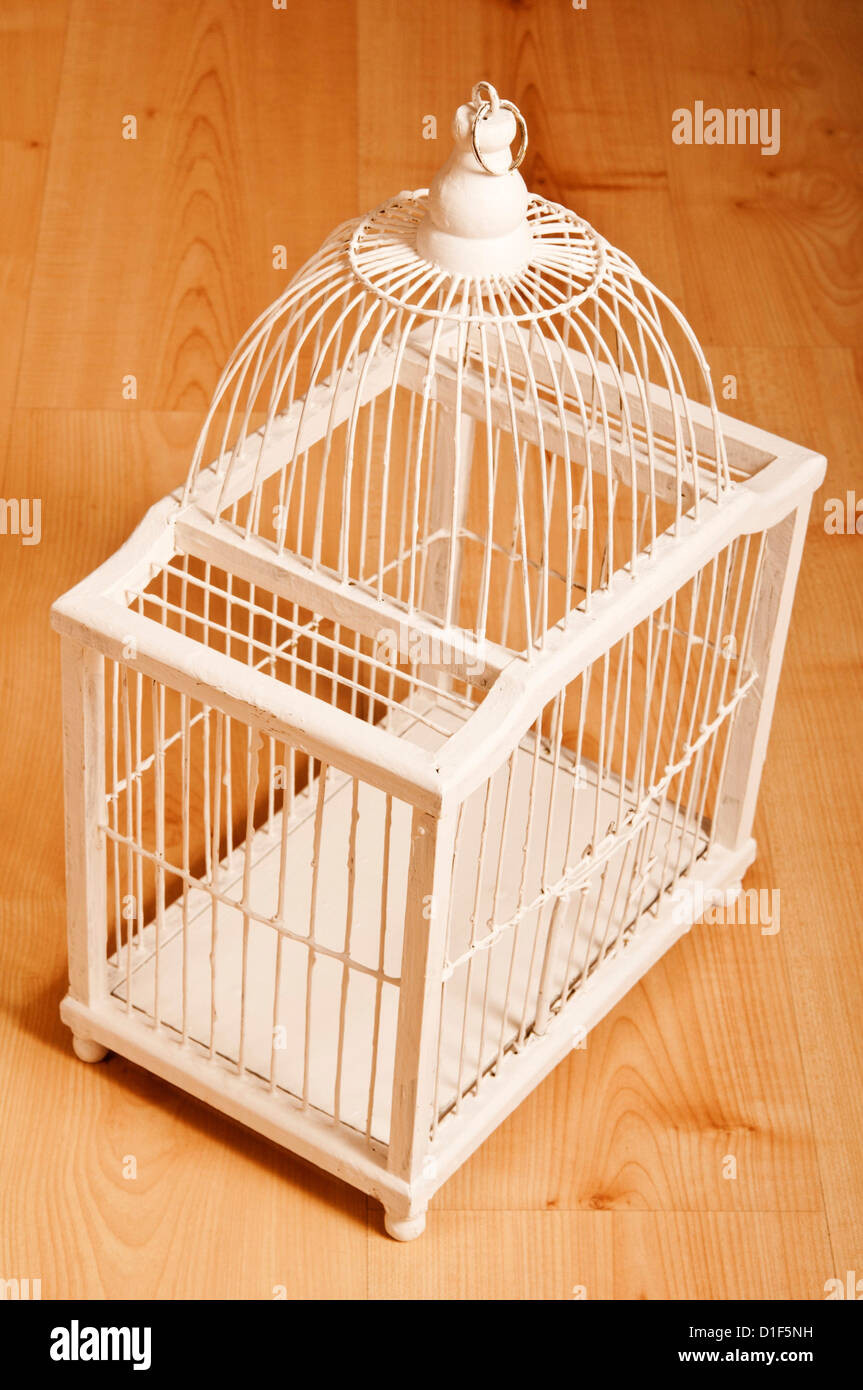 empty white wooden bird cage Stock Photo - Alamy