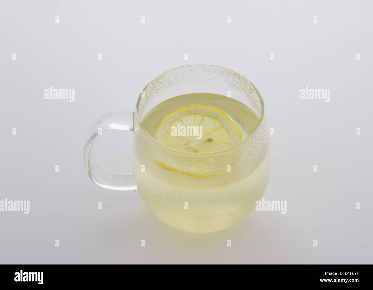 A glass of hot lemon drink Stock Photo - Alamy