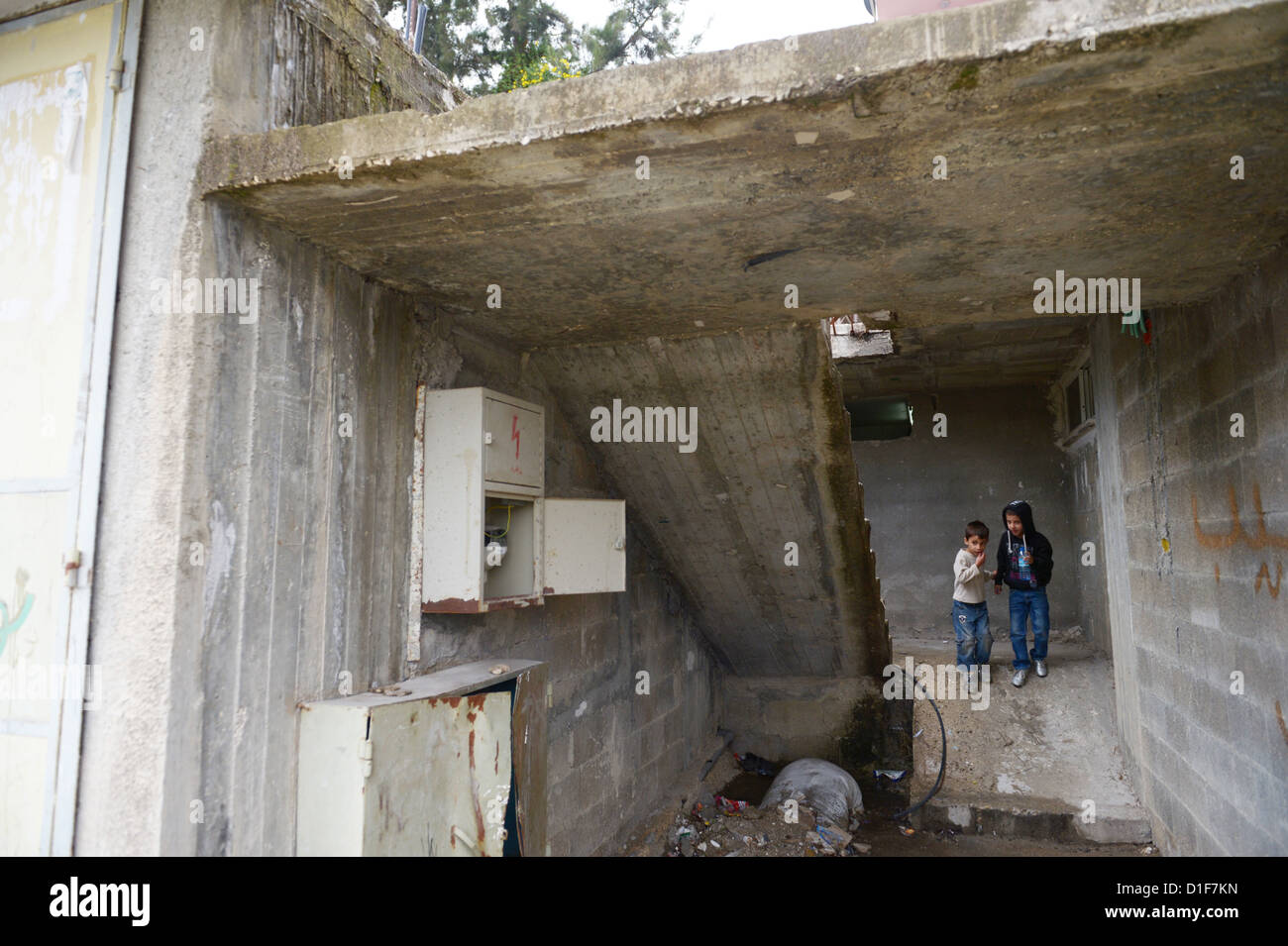 Children stand in an unfinished building at the refugee camp Balata in ...