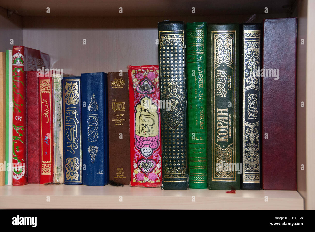 Qurans in different languages in a mosque in Rusholme, Manchester Stock ...