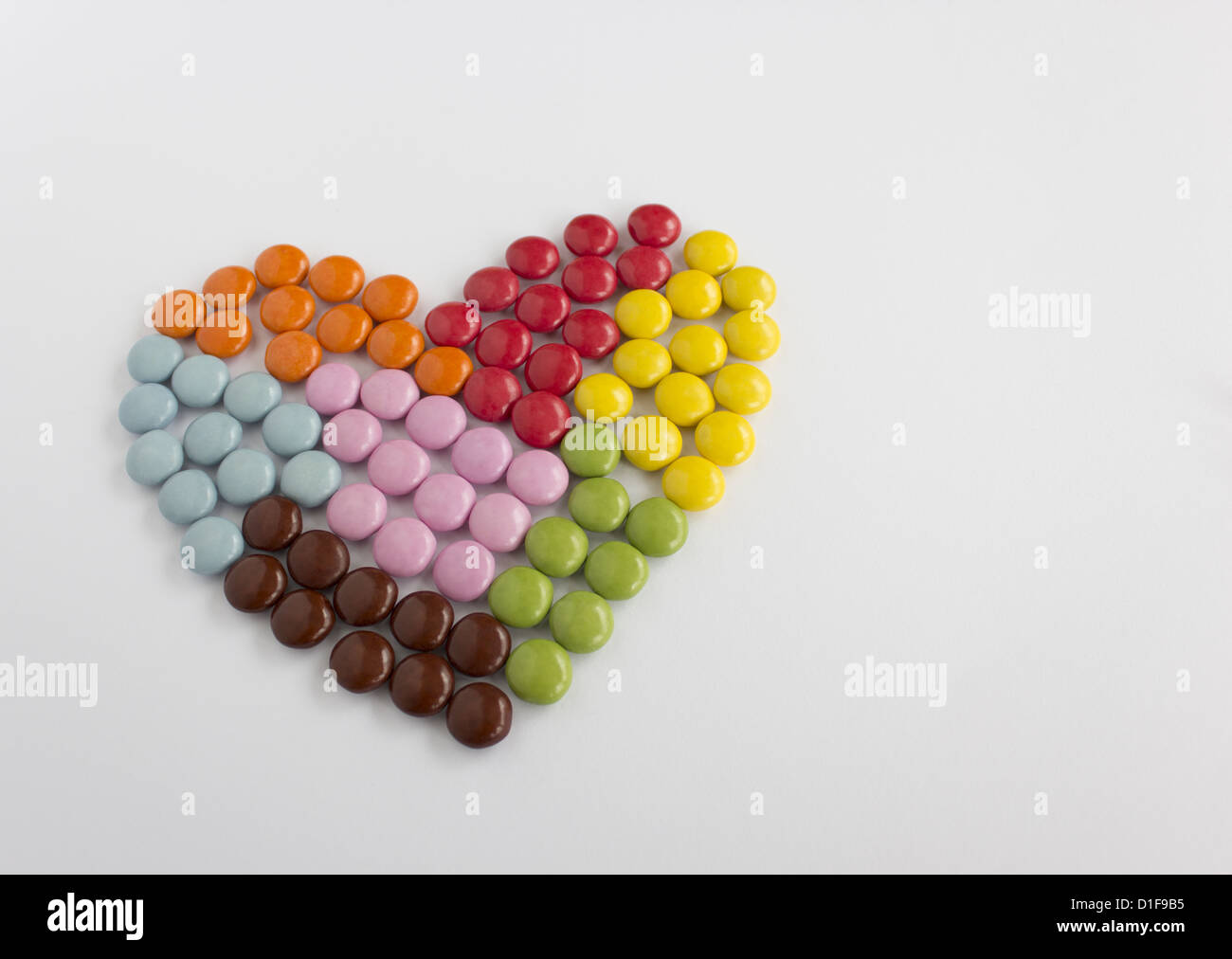 Heart-shaped chocolate marbles Stock Photo - Alamy