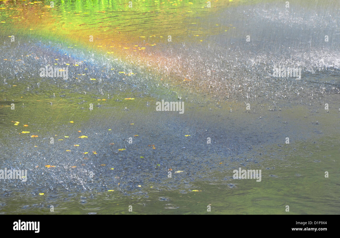 The appearance of the rainbow in the rain Stock Photo - Alamy