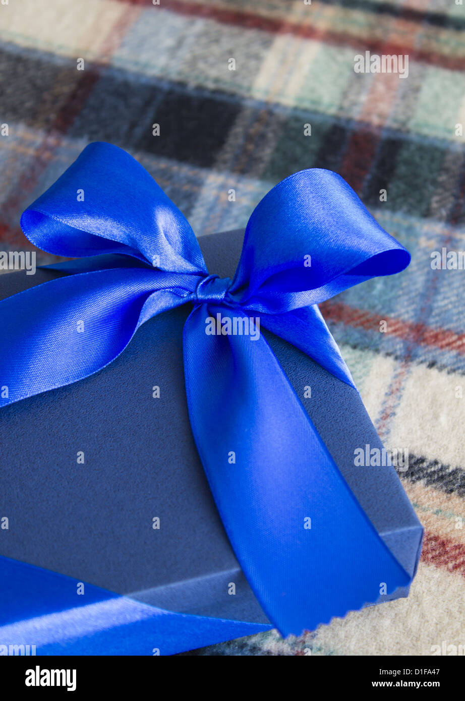 Check stole and a blue gift box Stock Photo - Alamy