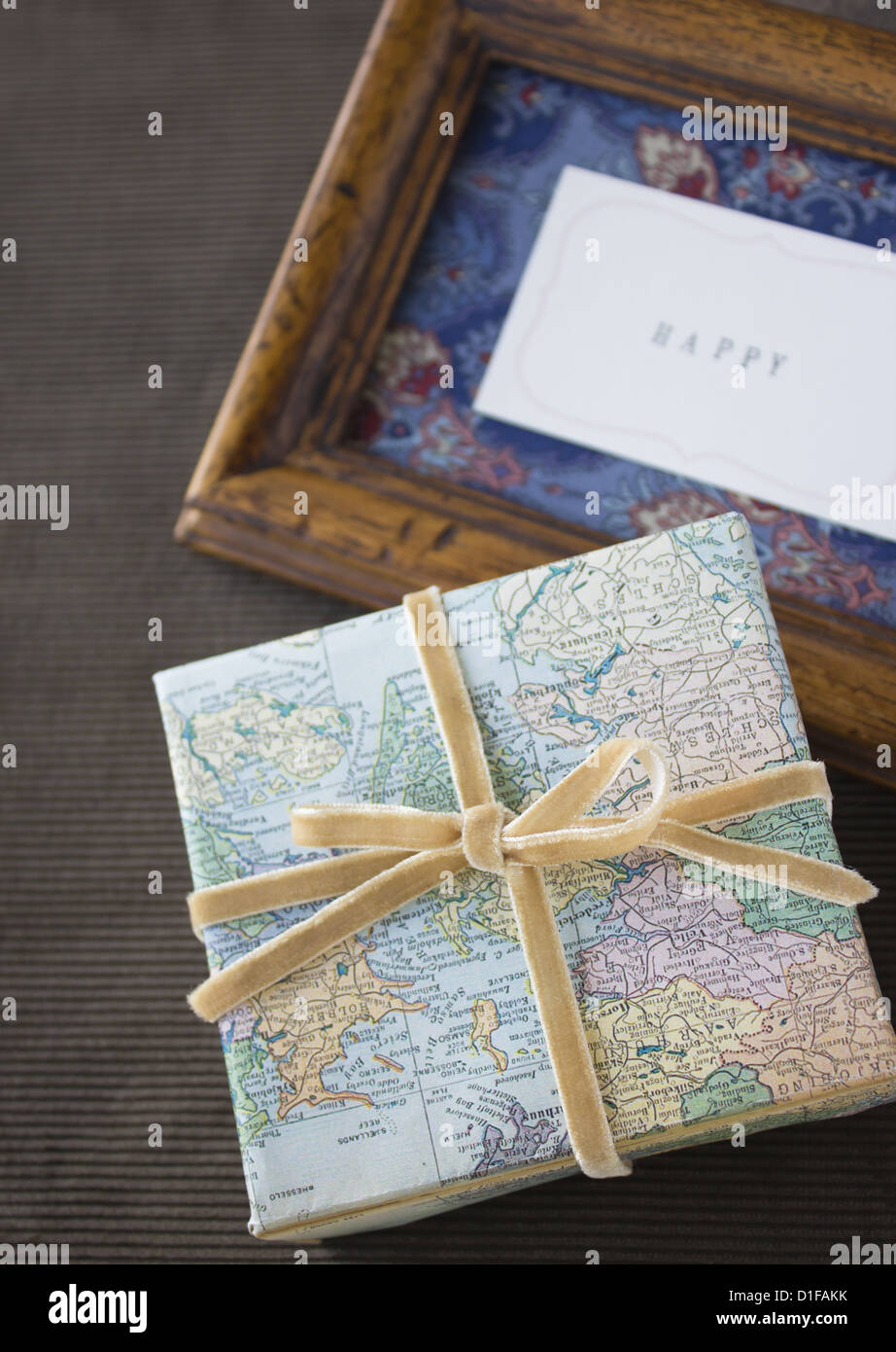Gift box and a photo frame Stock Photo - Alamy