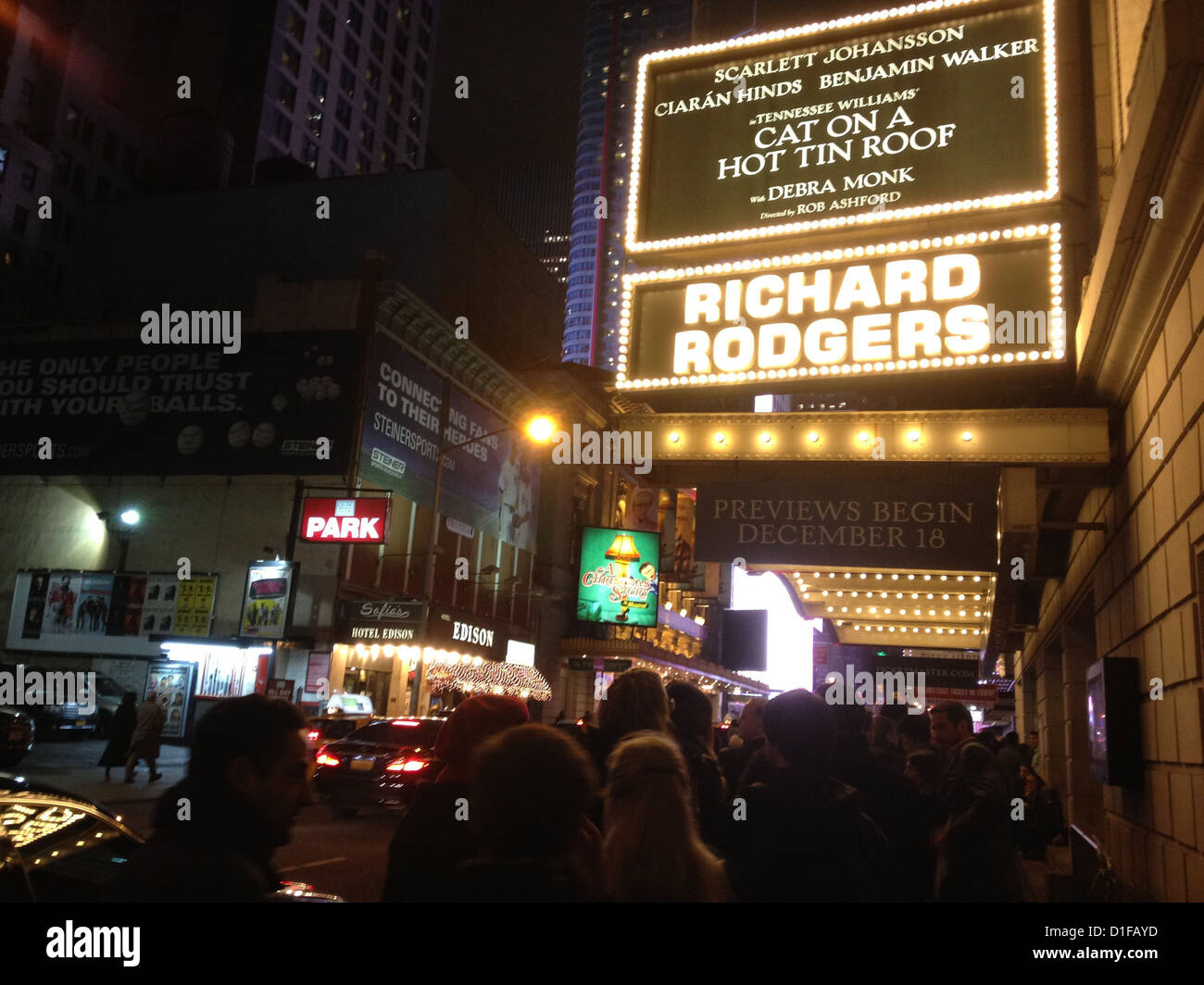 People queue for the premiere of the theatre play 'The cat on the hot ...