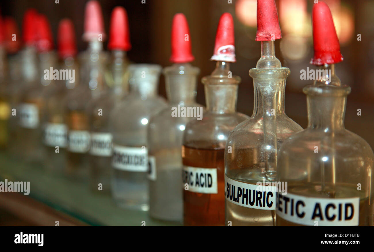 Glass bottles with different liquids Stock Photo - Alamy