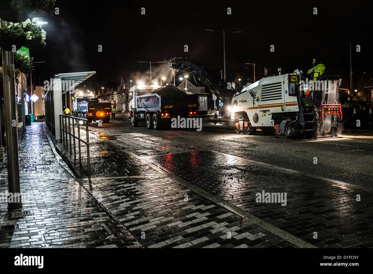 Replacing the road surface at night hi-res stock photography and images ...