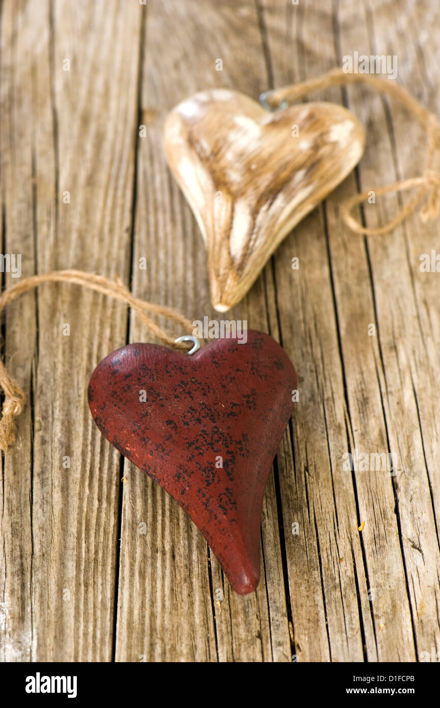 Two hearts on wood Stock Photo - Alamy